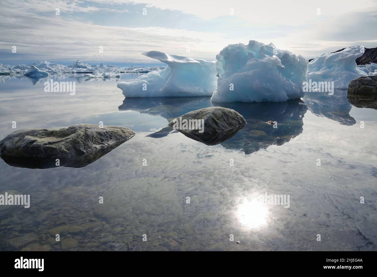 Sun reflection at the arctic beach Stock Photo - Alamy