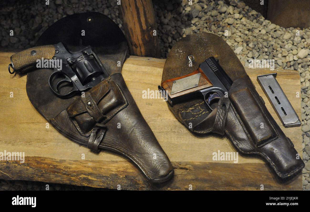 From left to right: holster and revolver Nagant M1895 belonging to ...