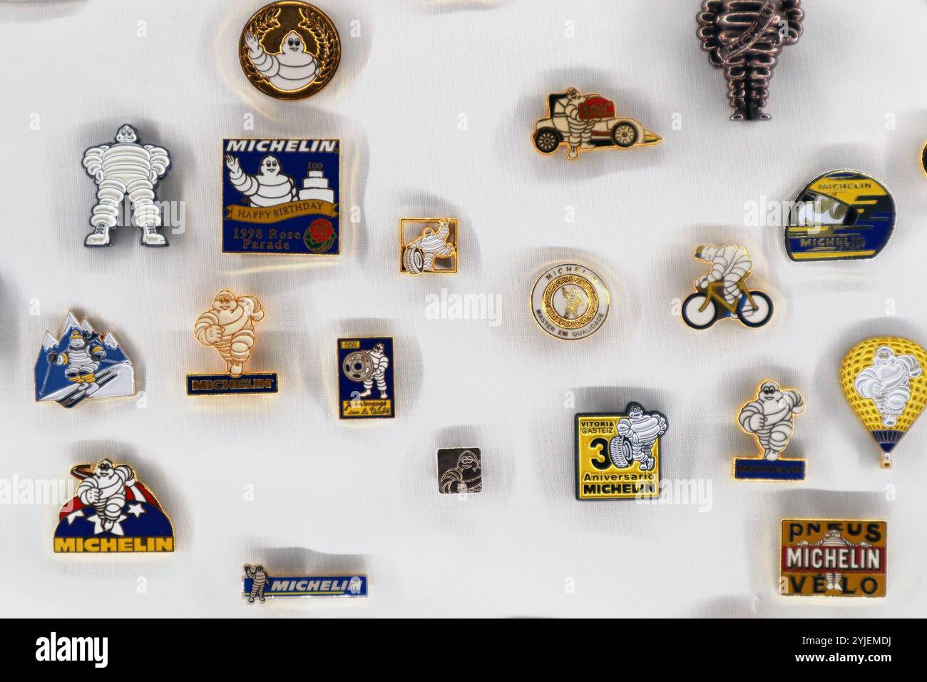 Vintage Michelin badges featuring their mascot Bibendum Stock Photo - Alamy