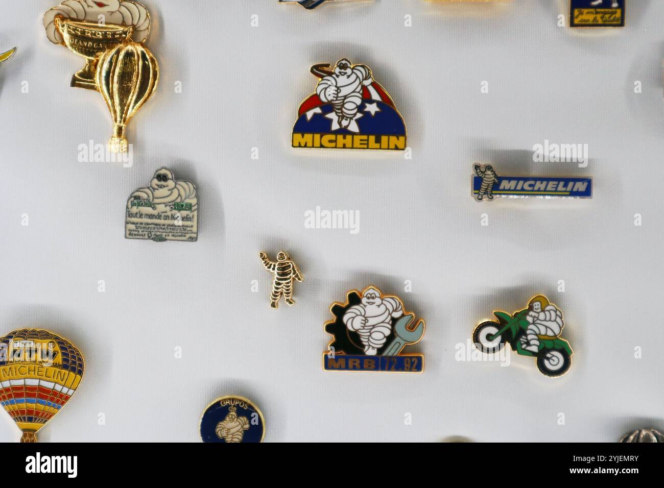 Vintage Michelin badges featuring their mascot Bibendum Stock Photo - Alamy