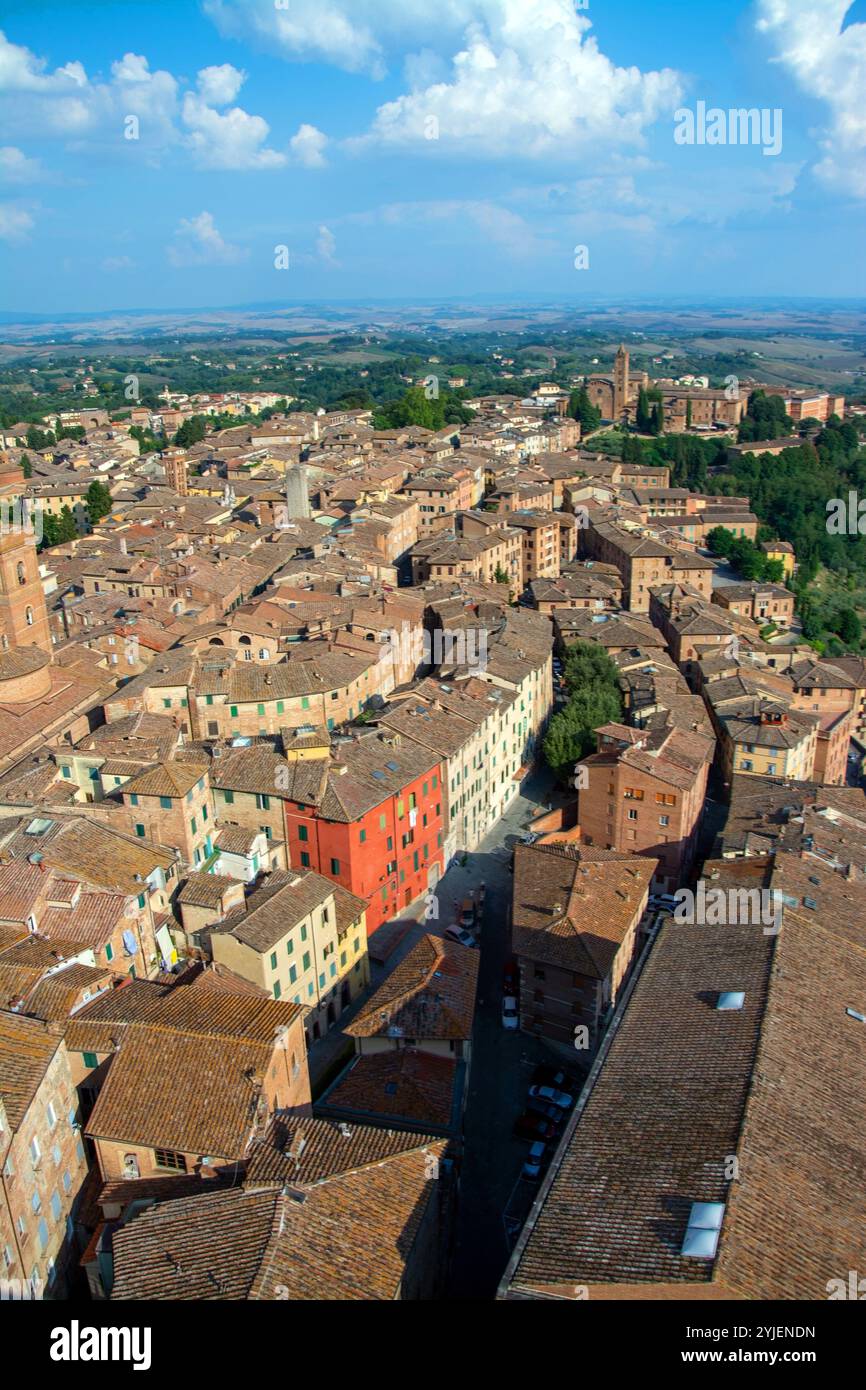 Siena is an Italian city in Tuscany known for its medieval brick ...
