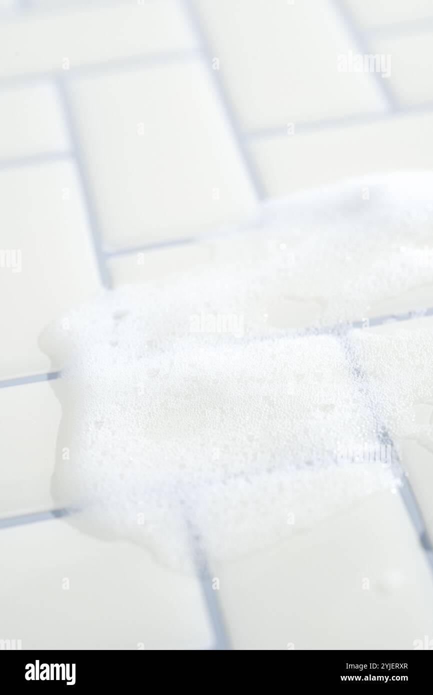 Soap Bubbles on Clean White Bathroom Tiles Stock Photo - Alamy
