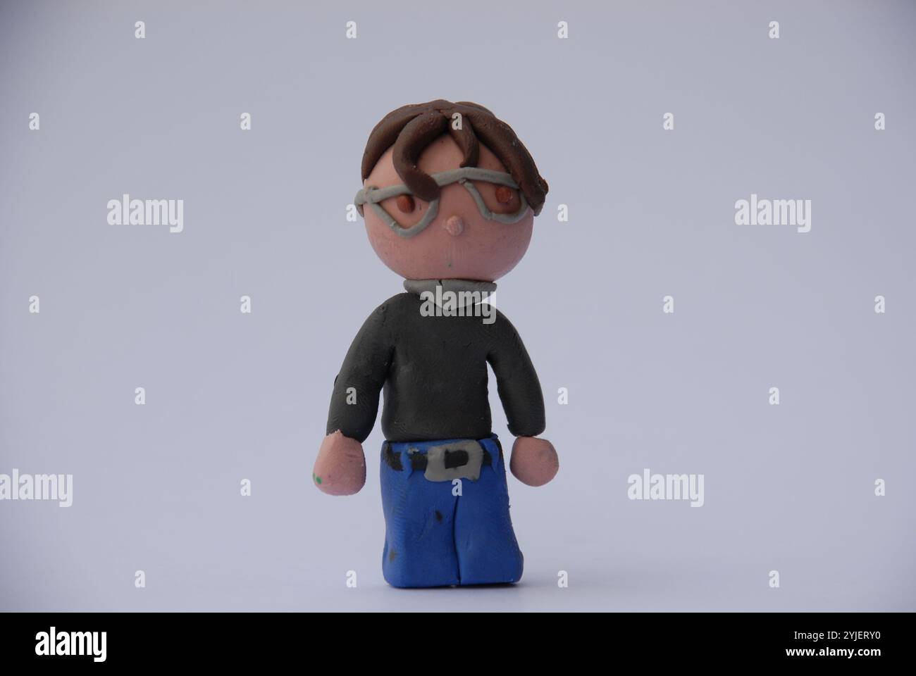 3D rendering in stylized clay of young man with brown hair and glasses ...