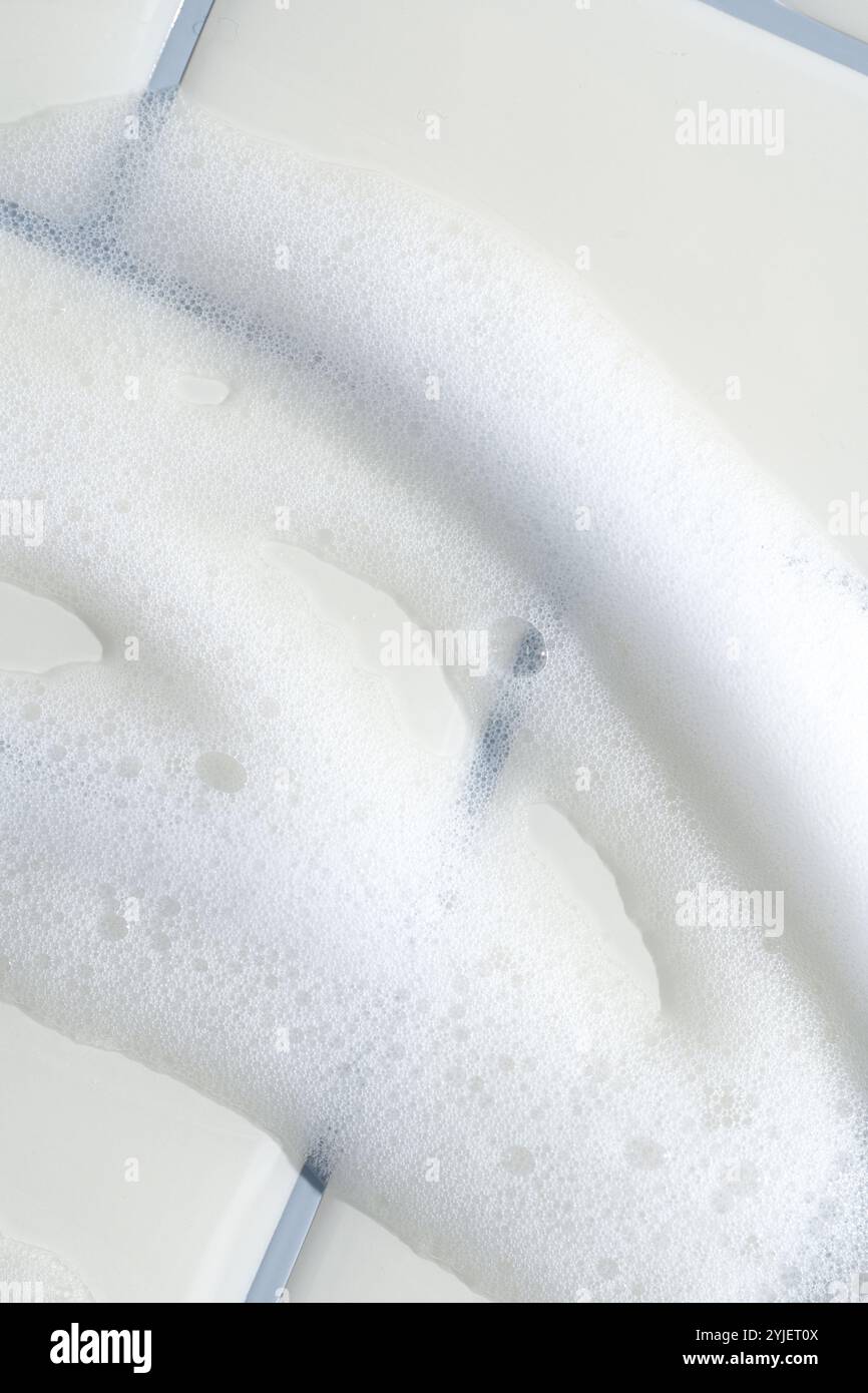 Soap Bubbles on Clean White Bathroom Tiles Stock Photo - Alamy