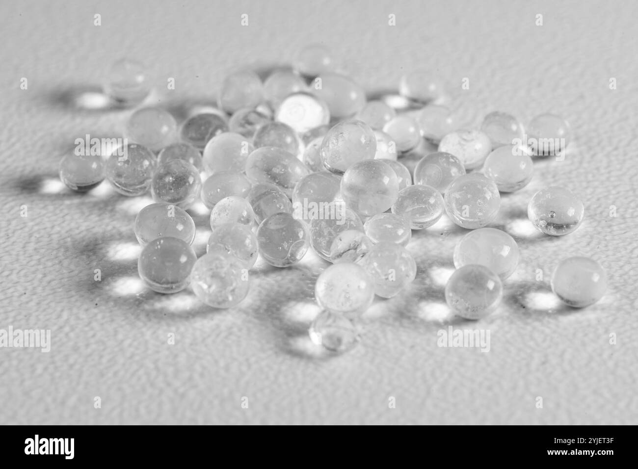 Transparent Plastic Pellets on White Surface Stock Photo - Alamy