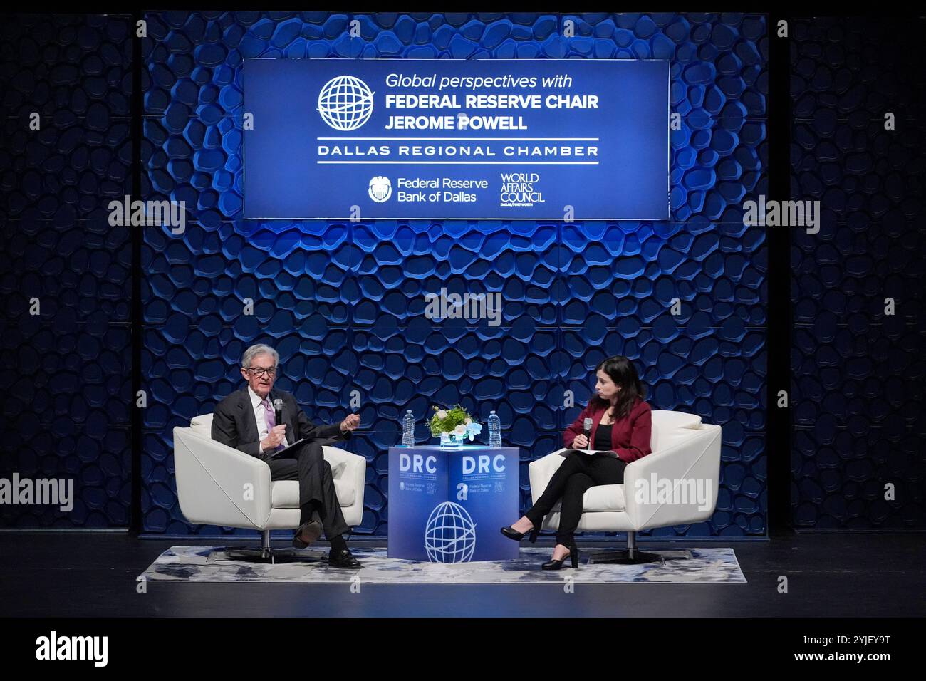 Federal Reserve Chair Jerome Powell, left, speaks to the Dallas ...