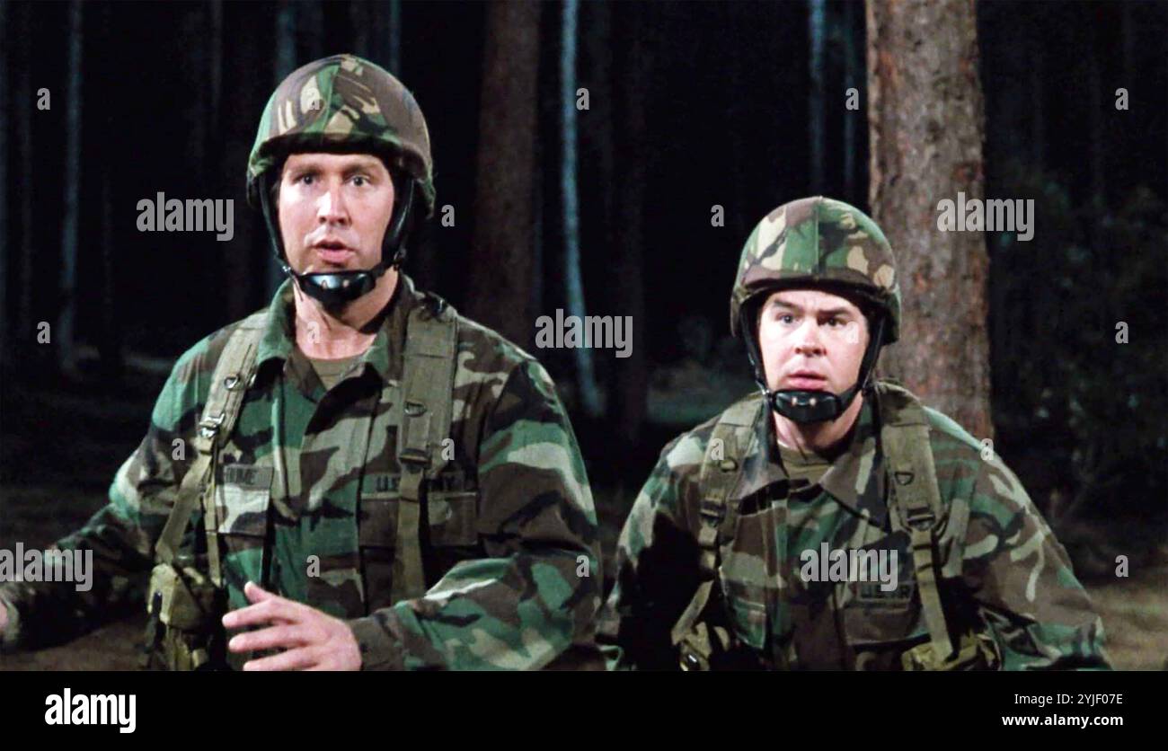 SPIES LIKE US 1985 Warner Bros. film with Chevy Chase at loeft as Ernest Fitz-Hume and Dan ...