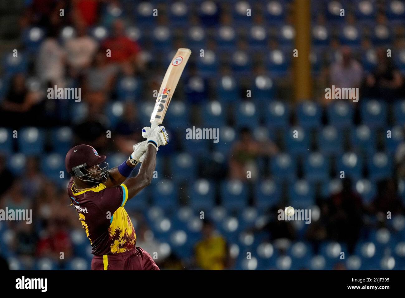West Indies' Romario Shepherd plays a shot against England during the ...