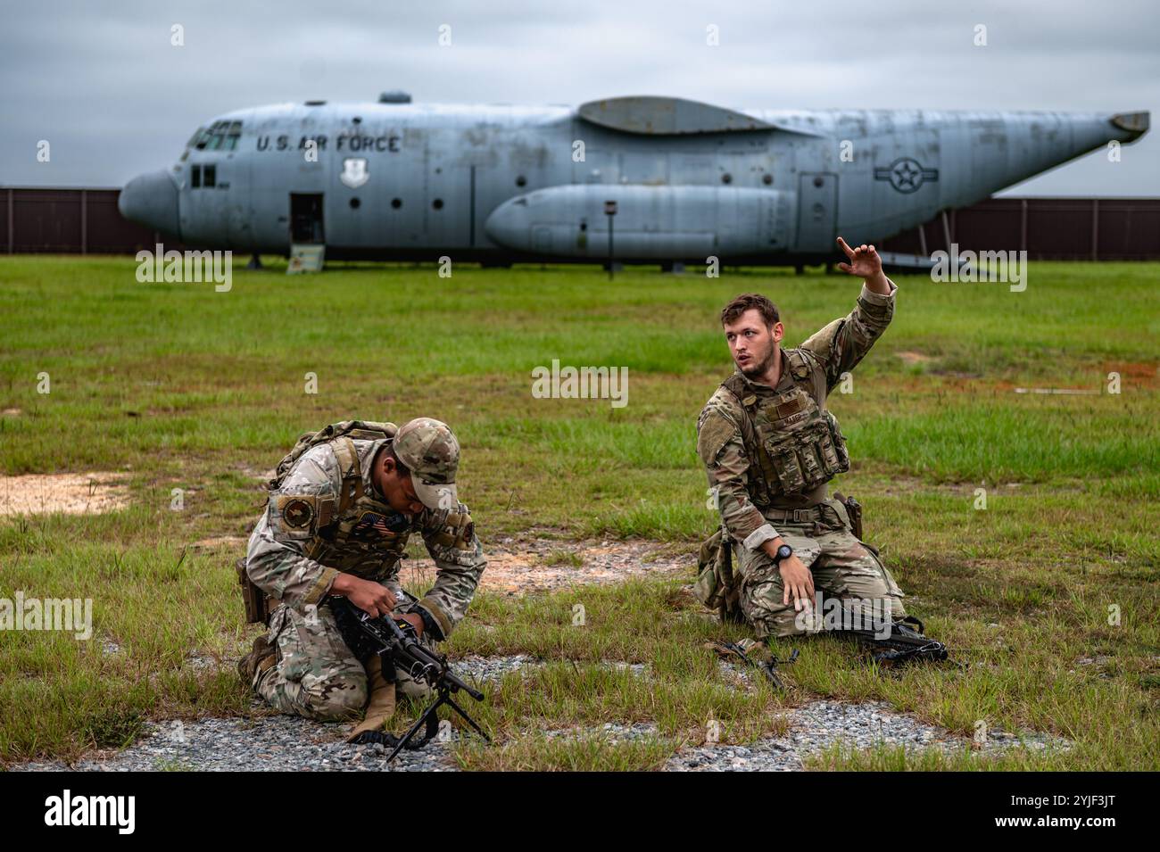 U.S. Air Force Staff Sgt. Jaizon Hemsley, left, 90th Ground Combat ...