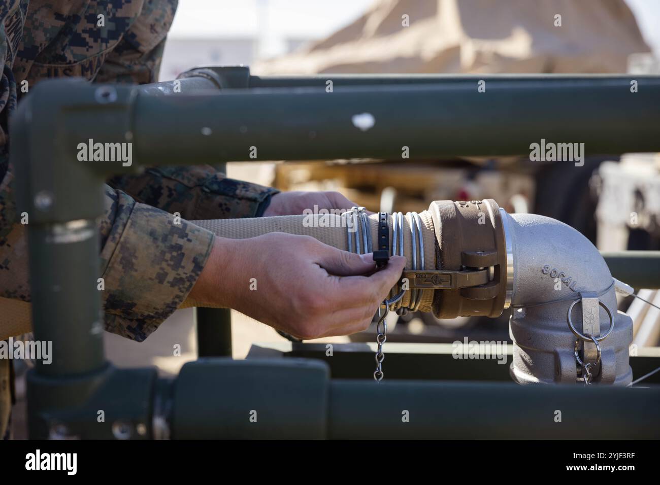 A U.S. Marine with 7th Engineer Support Battalion, 1st Marine Logistics ...