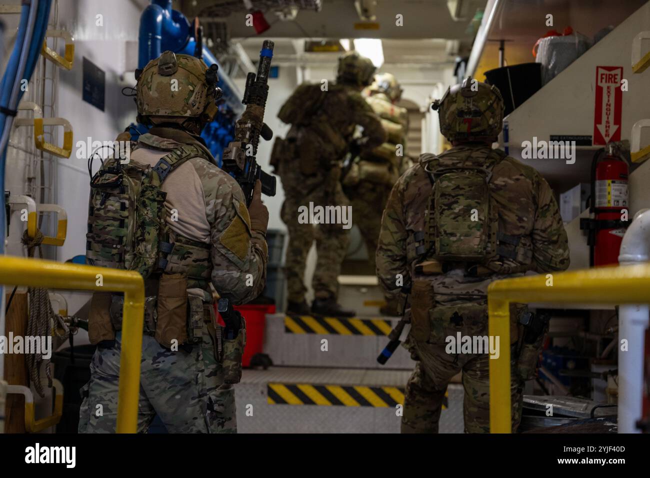 West Coast-based U.S. Naval Special Warfare (NSW) operators secure a ...