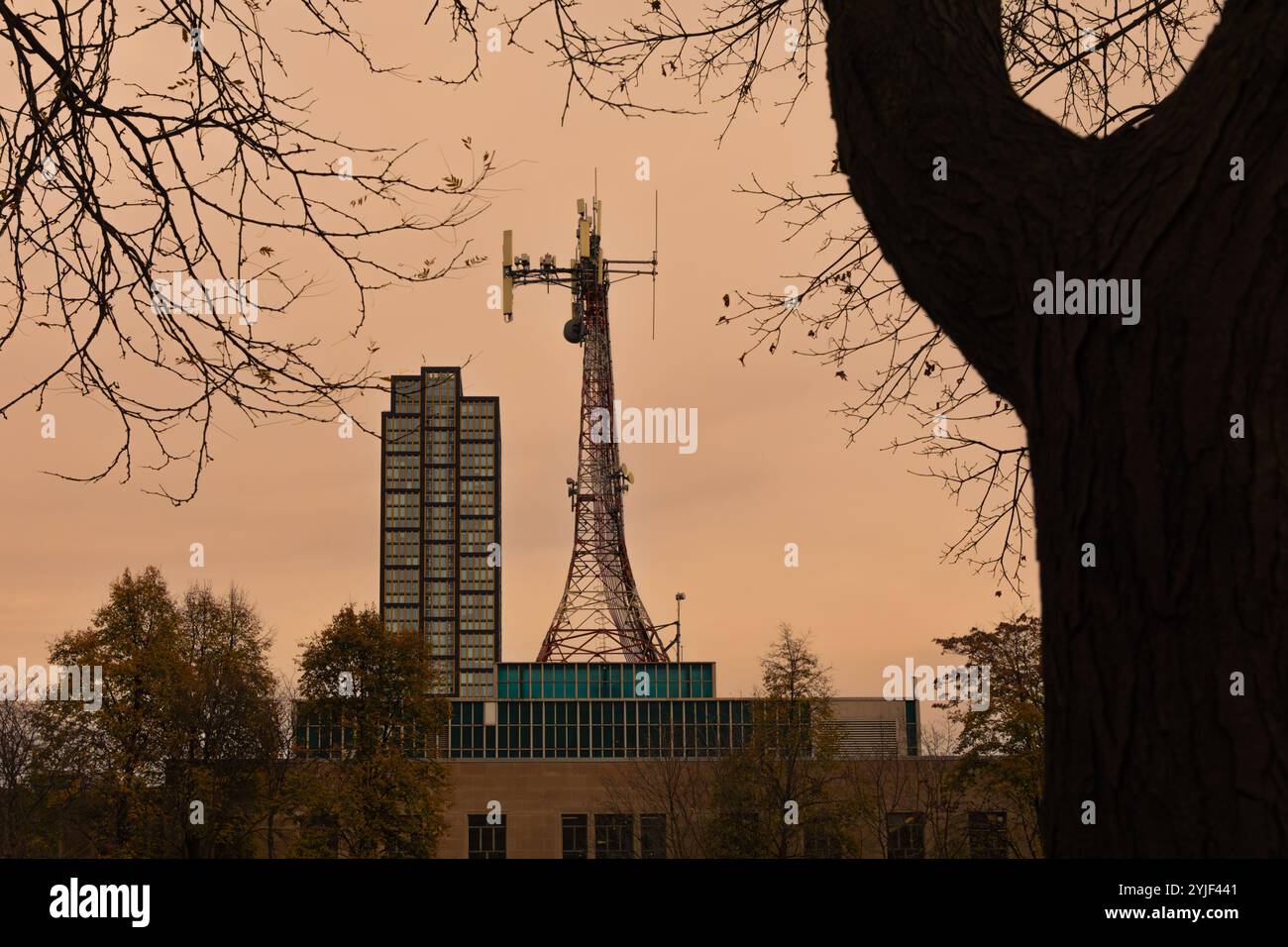 A microwave and radio tower is seen atop a building in downtown Toronto ...