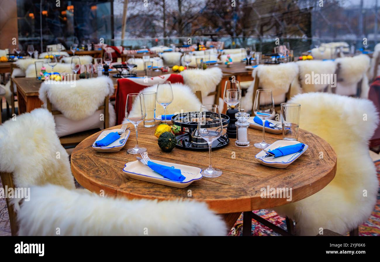 Rustic winter wonderland: wooden tables, cozy fur throws, Christmas ...