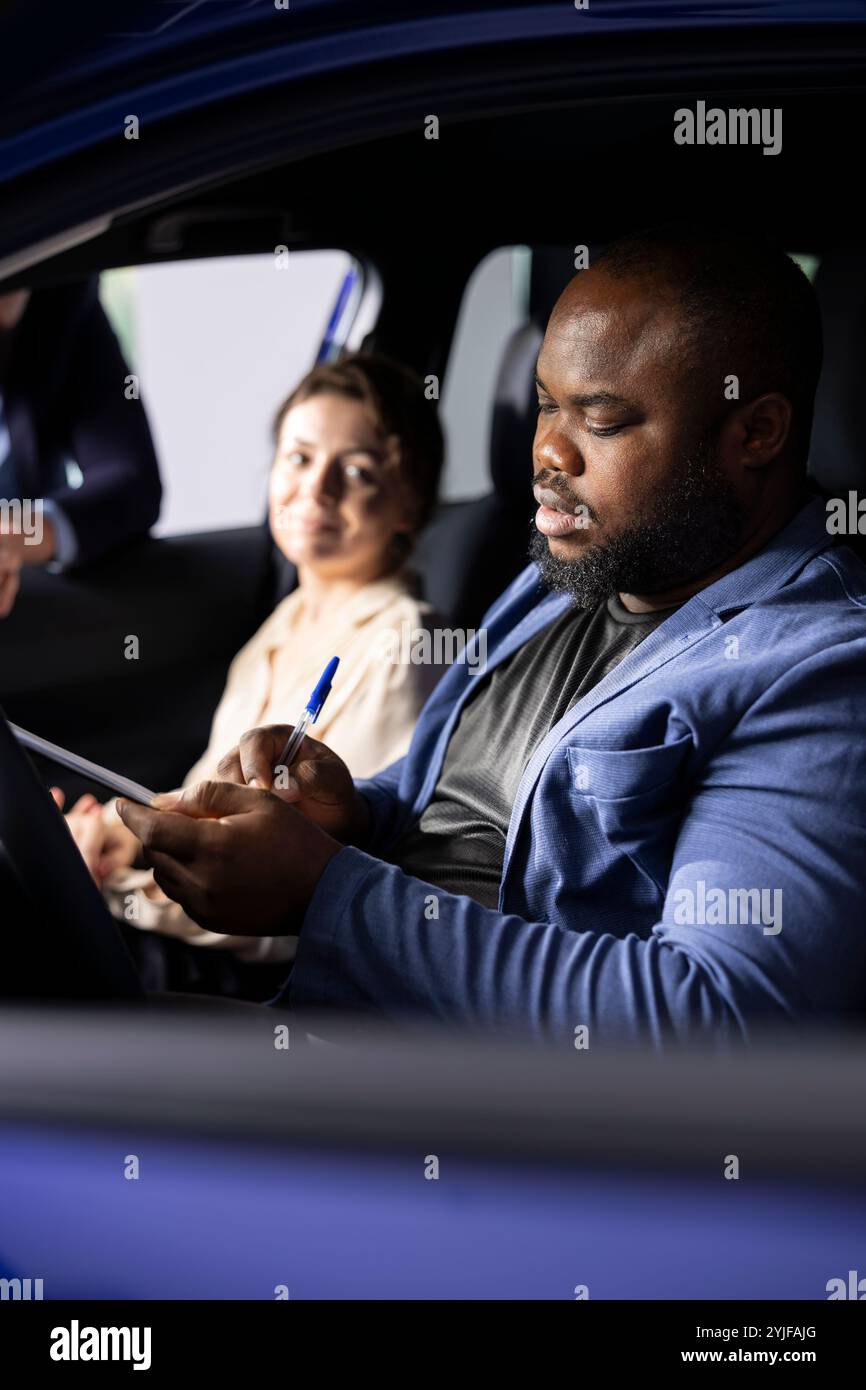 Showroom dealer signing forms hi-res stock photography and images - Alamy