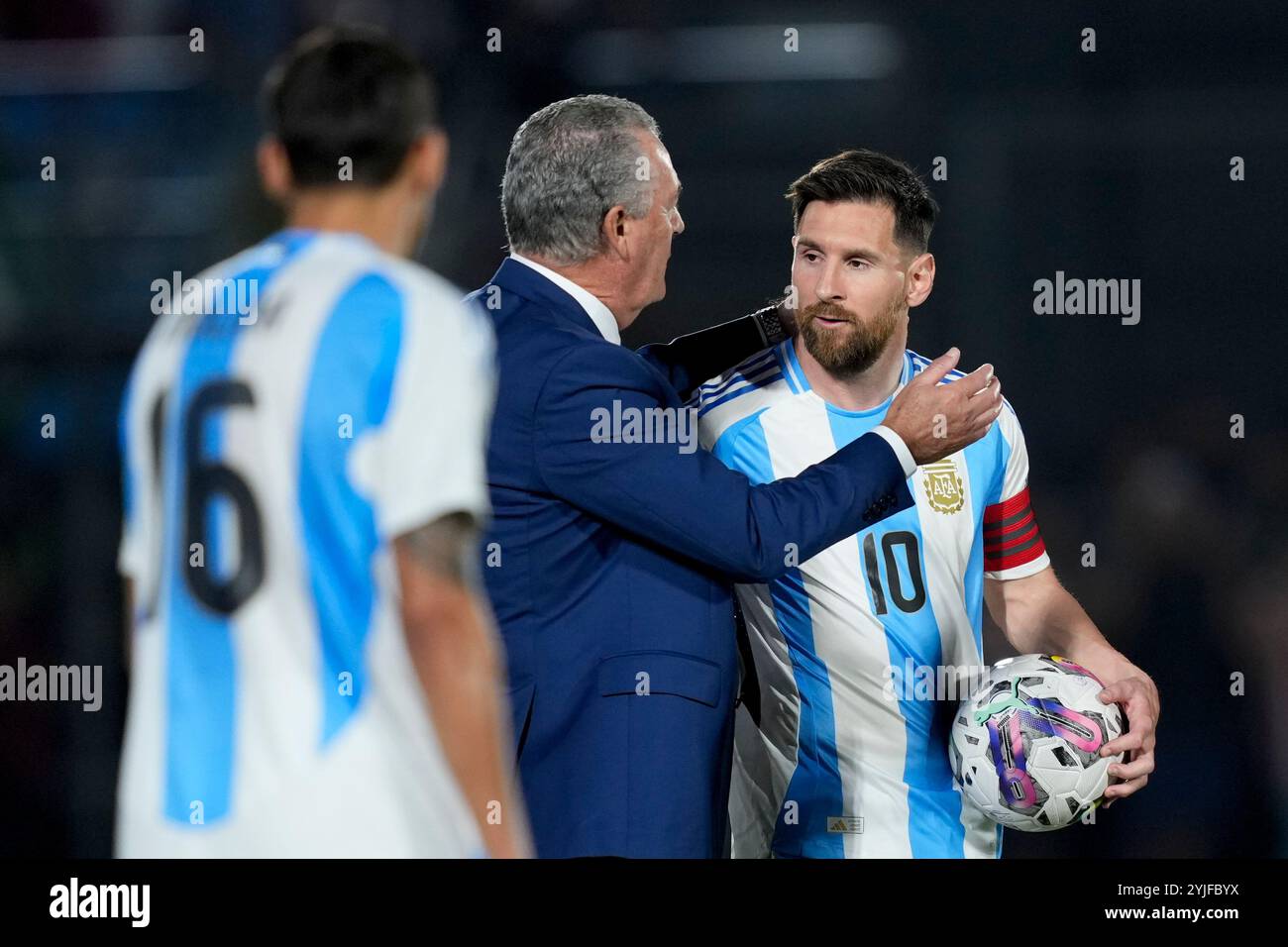 Paraguay's coach Gustavo Alfaro, center, greets Argentina's Lionel ...