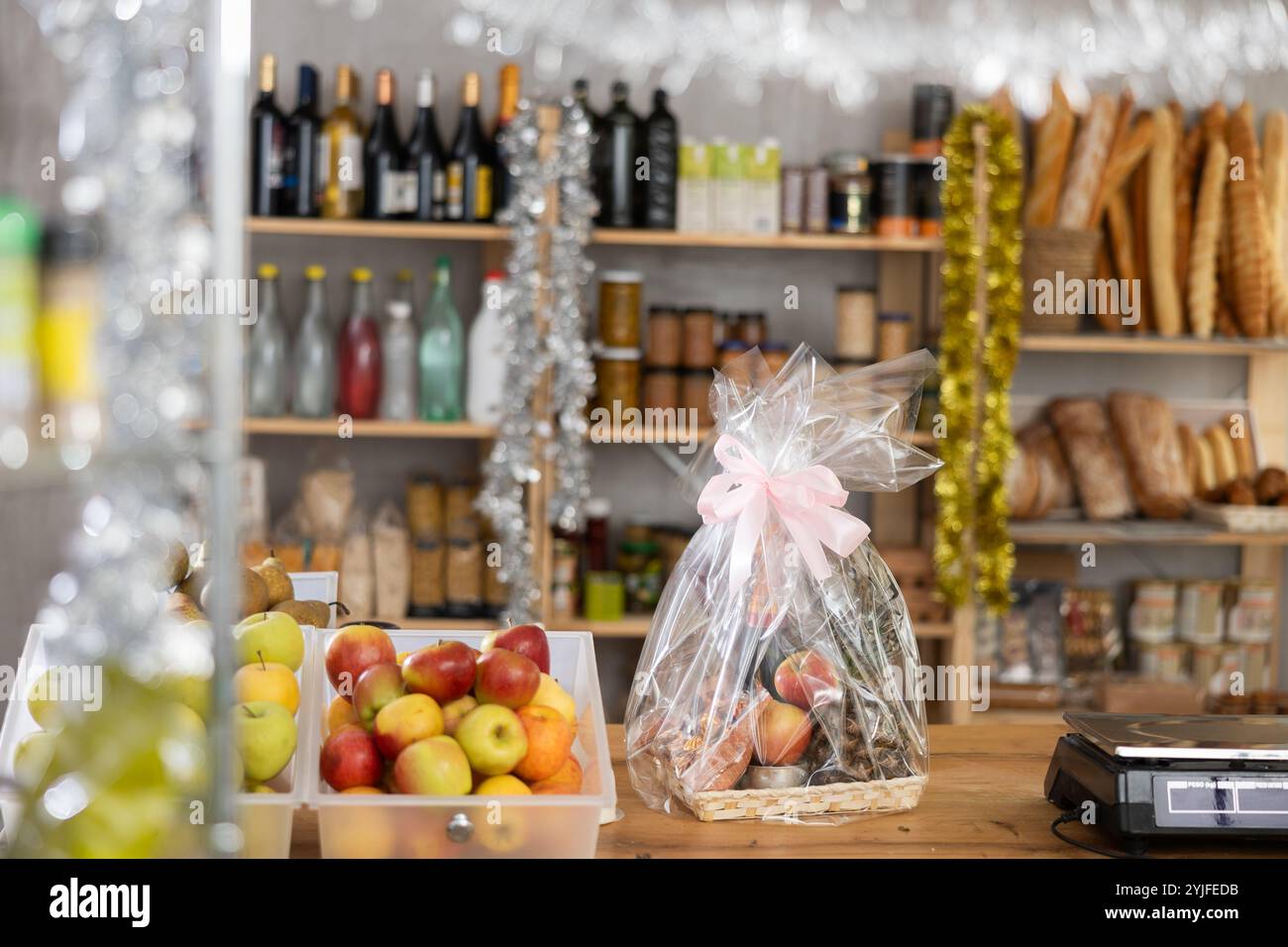 Gift box of food on counter in grocery store Stock Photo - Alamy