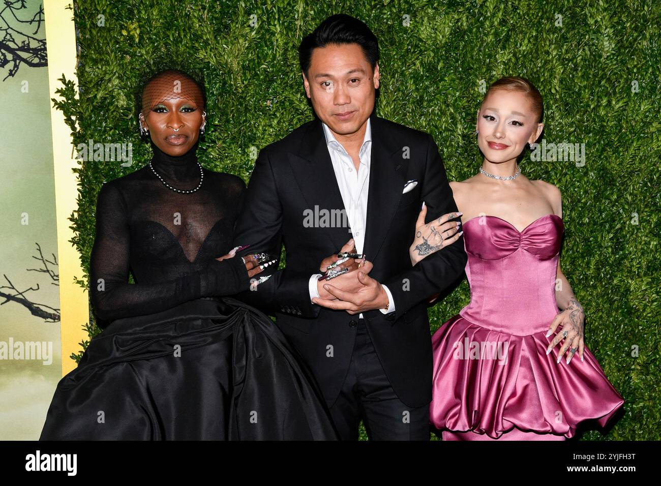 Cynthia Erivo, from left, Jon M. Chu, and Ariana Grande attend the ...