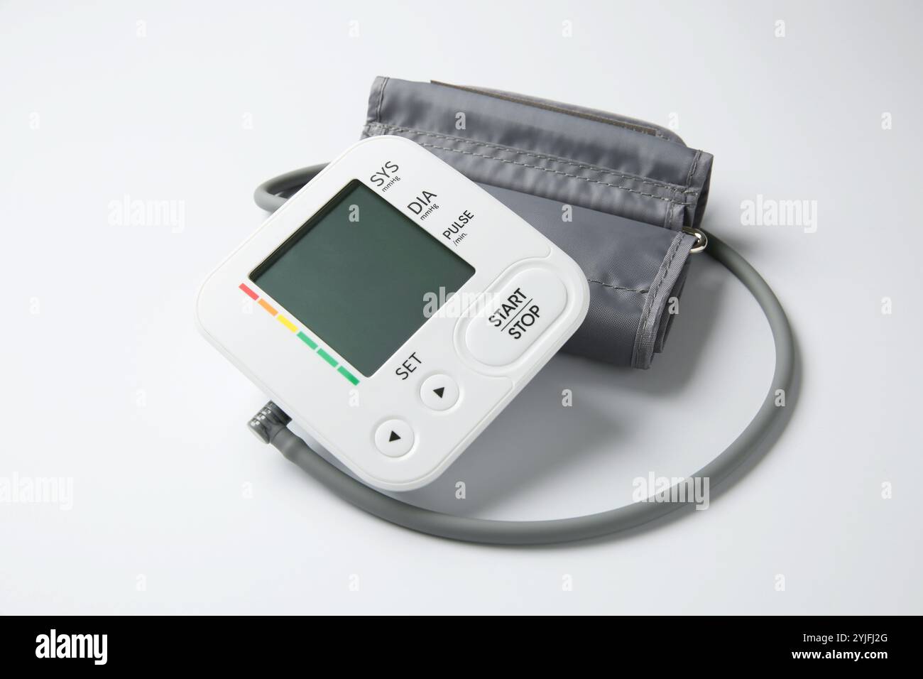 Blood pressure measuring device on white background Stock Photo - Alamy