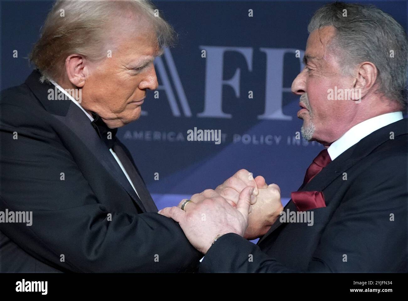 President-elect Donald Trump greets actor Sylvester Stallone during an ...