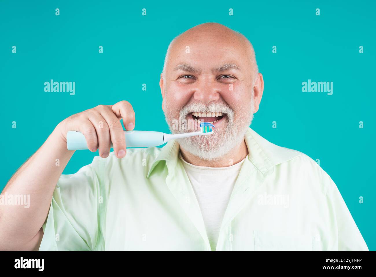 Brushing teeth. Senior holding toothbrush for tooth brushing. Dentistry ...