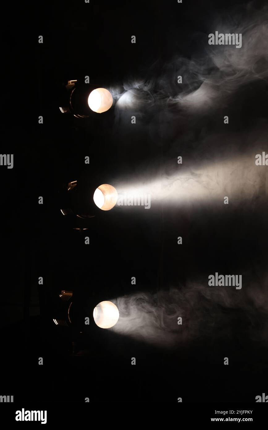 Professional spotlights and smoke on stage in theatre Stock Photo - Alamy