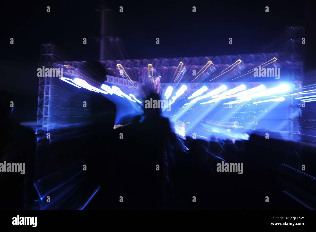 Stage lighting effect in the dark, fuzzy figure Stock Photo - Alamy