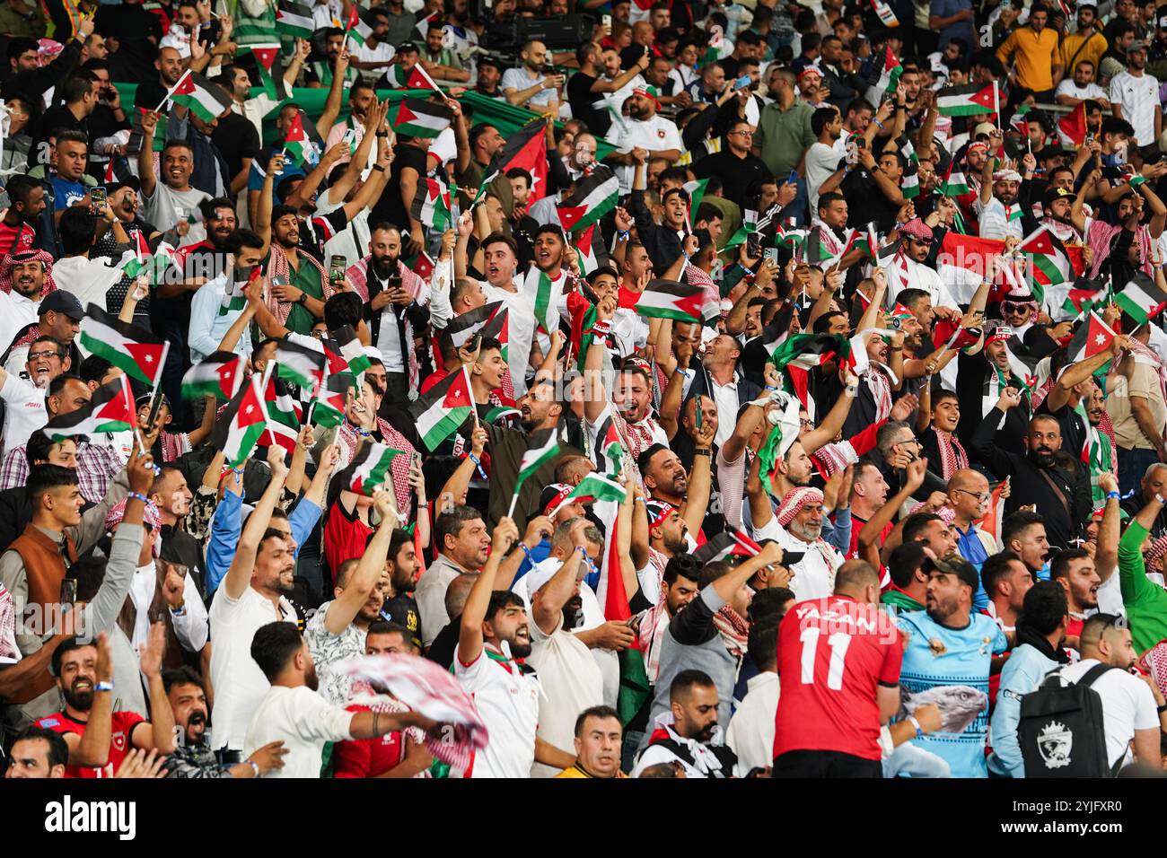 Basra, Iraq. 14th Nov, 2024. Jordanian fans cheer during the 2026 FIFA ...