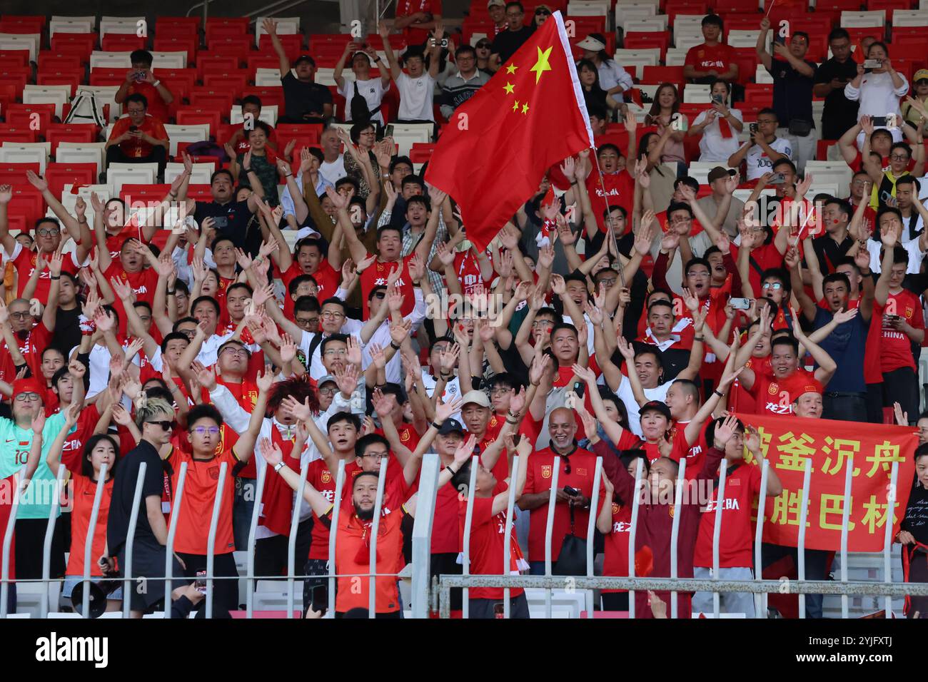 Riffa, Bahrain. 14th Nov, 2024. Fans of China cheer before the 2026 ...