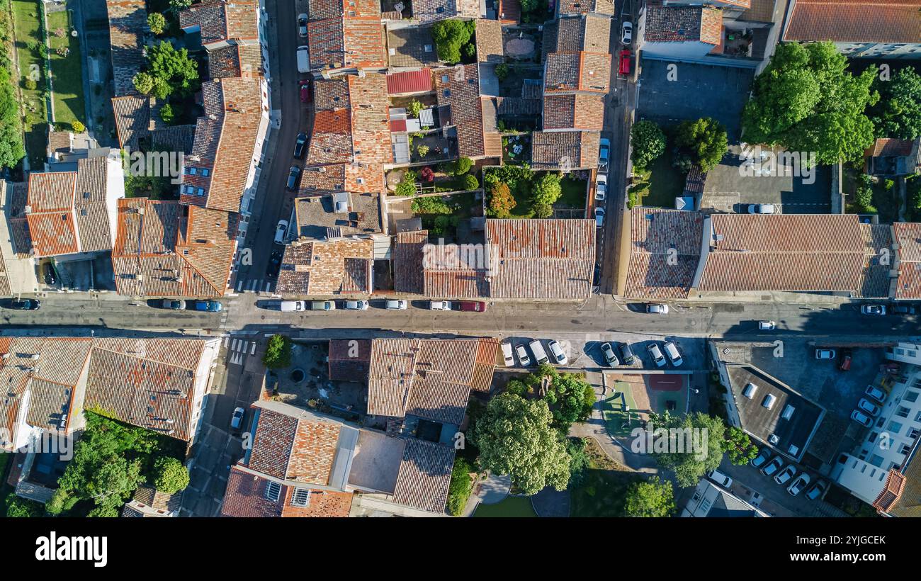Aerial top view of residential area houses roofs and streets from above ...