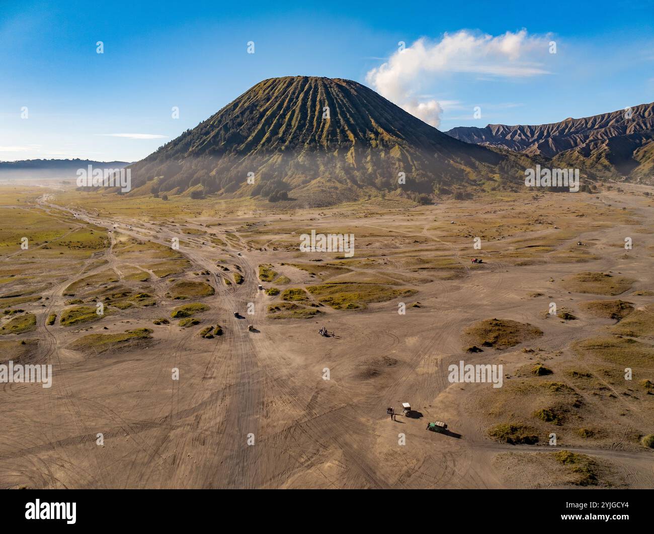 Aerial view of adventure off-road car on path to Mount Bromo volcano ...