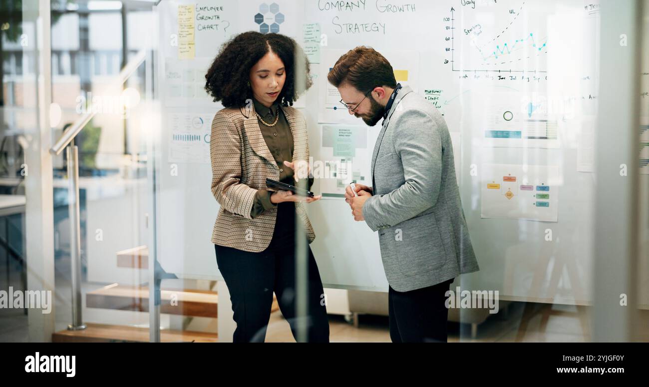 Team, tablet and business people planning, strategy discussion and ...