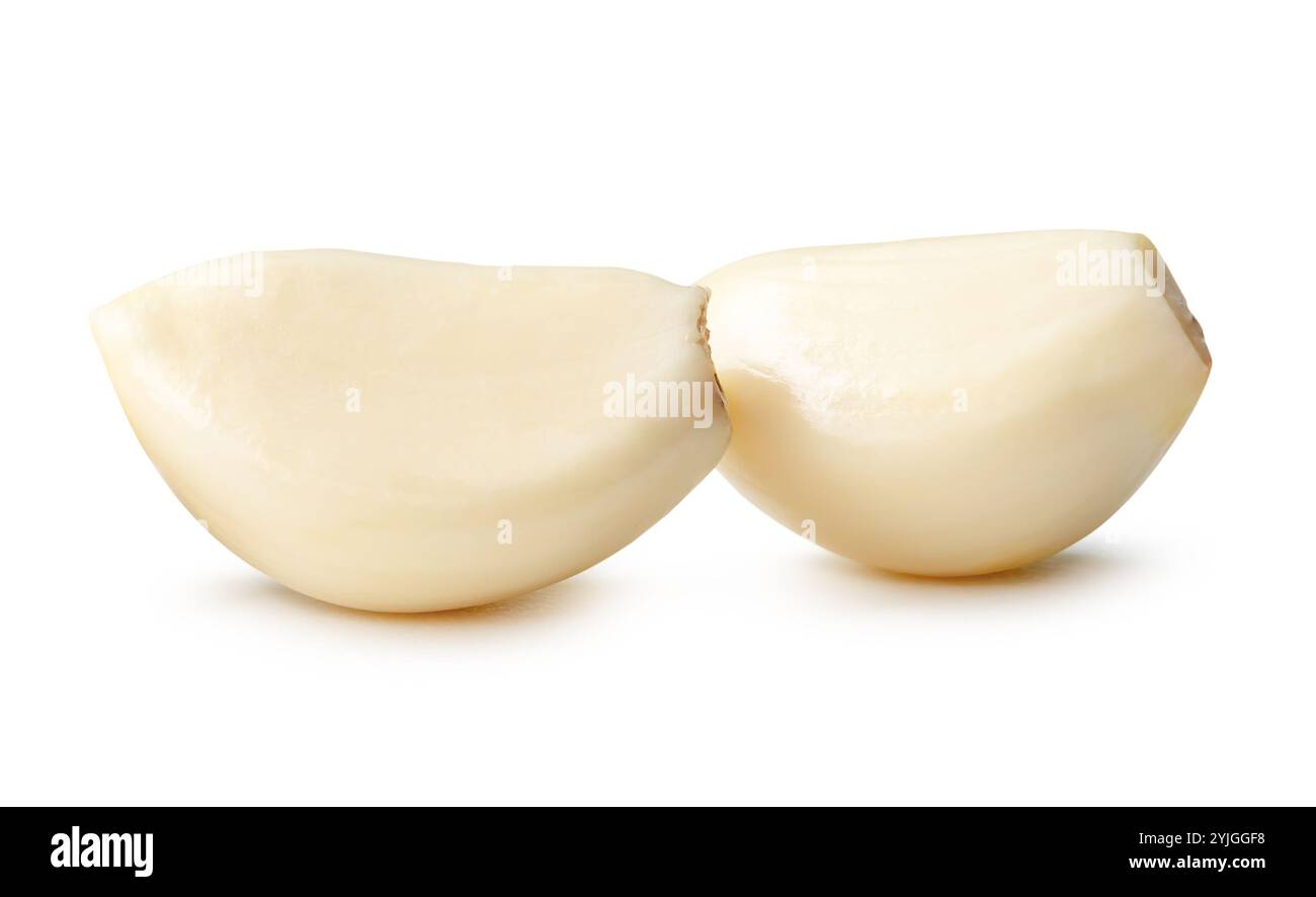 Side view of peeled garlic cloves in stack is isolated on white ...