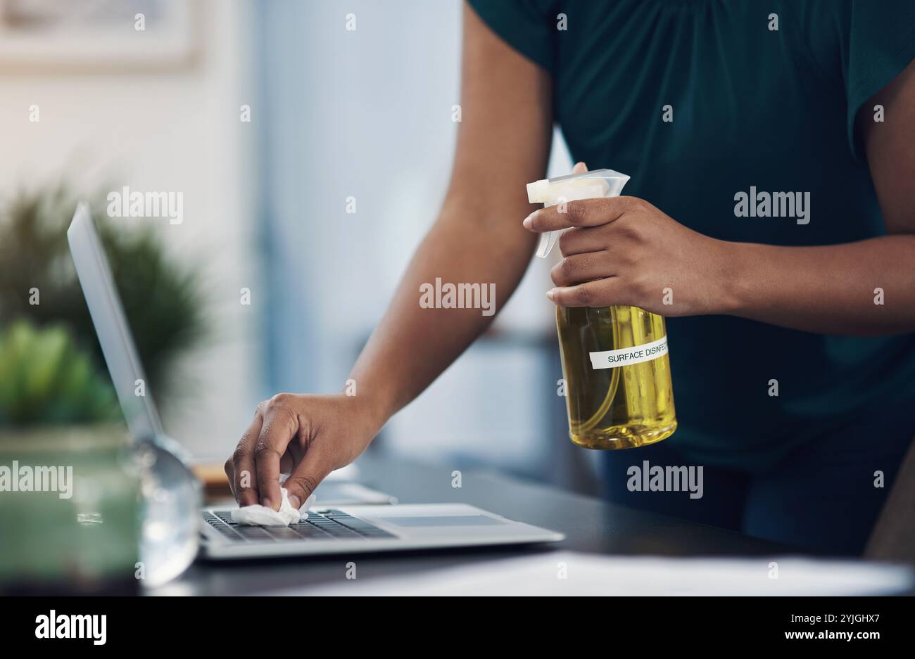 Woman, office and hands for cleaning laptop, employee and disinfection ...