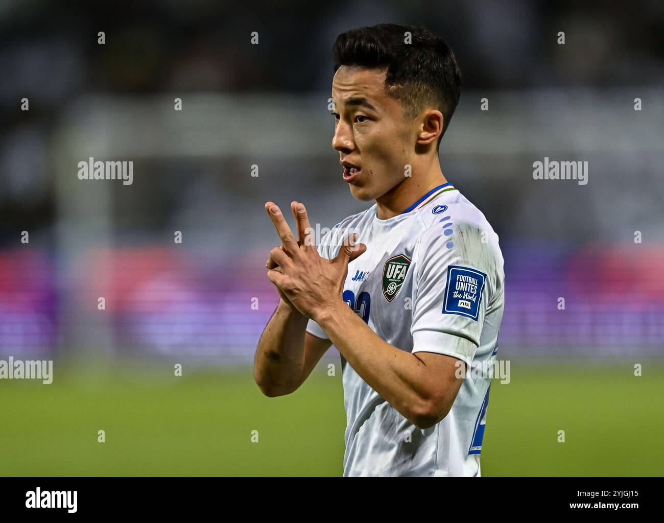 Doha. 14th Nov, 2024. Abbosbek Fayzullaev of Uzbekistan celebrates ...