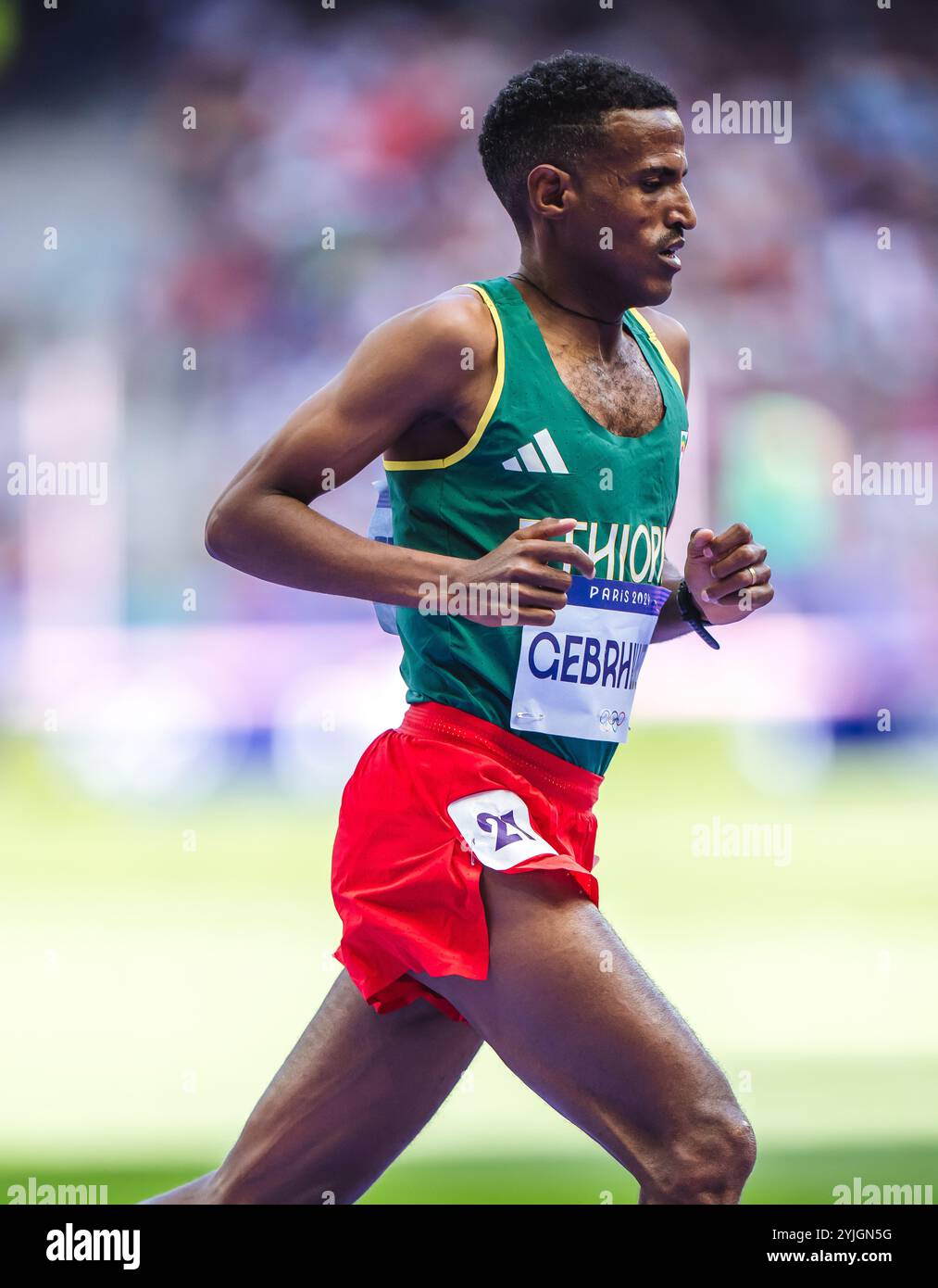 Hagos Gebrhiwet participating in the 5000 meters at the Paris 2024 ...