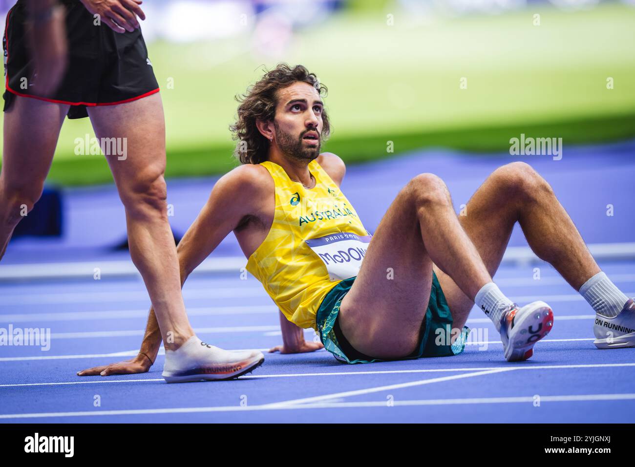 Morgan McDonald participating in the 5000 meters at the Paris 2024 ...