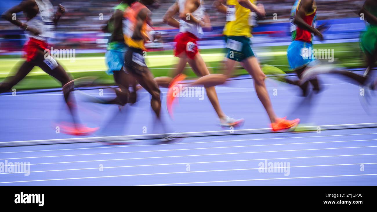 Image of Runners in motion in the 5000 meters at the Paris 2024 Olympic ...