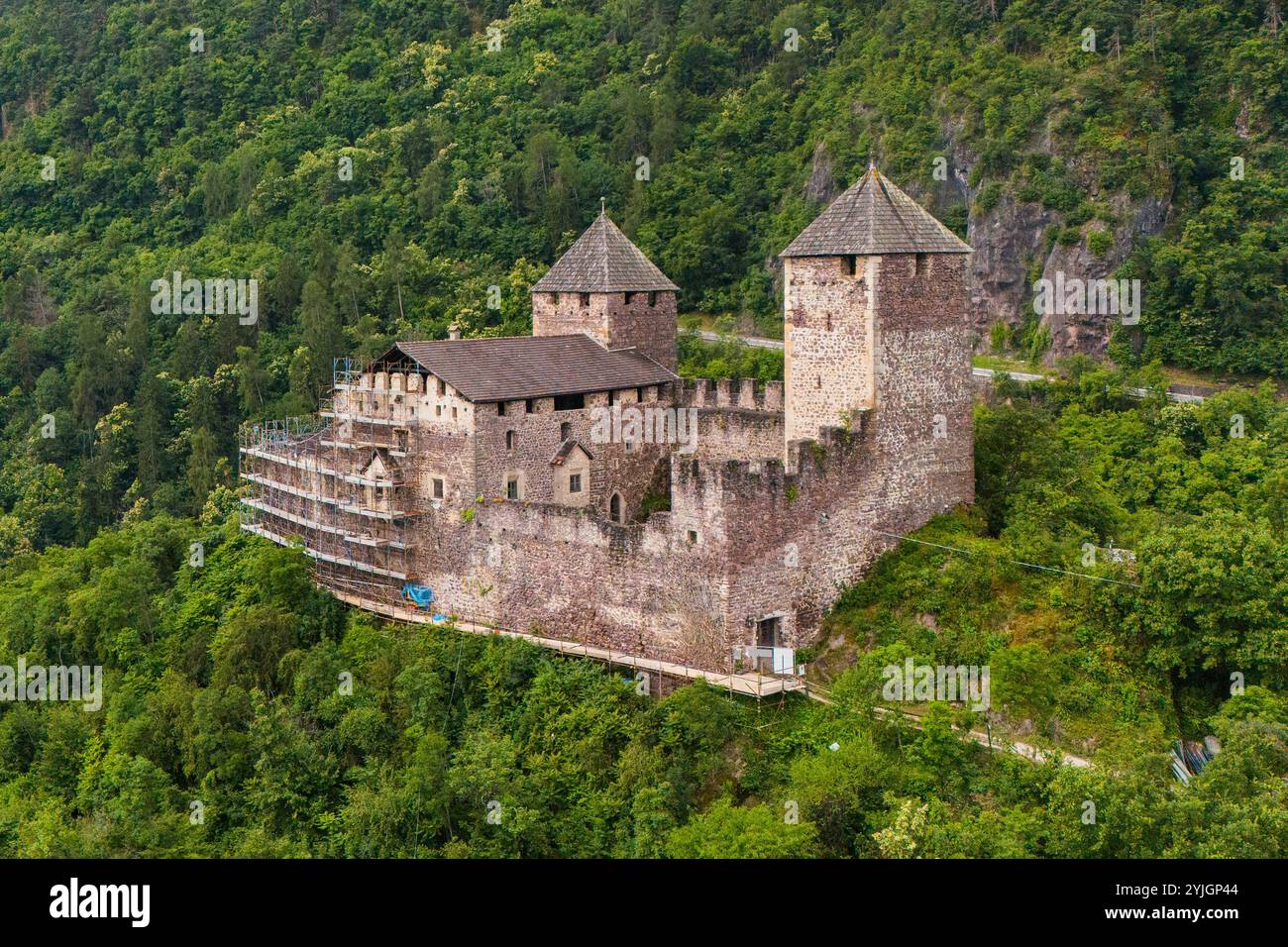 LANA, ITALY – AUGUST 28, 2024: Castel Leone stands majestically above Lana, showcasing its ...