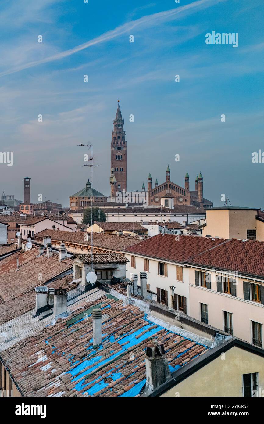 The charming city of cremona in italy at sunset, showcasing rooftops ...