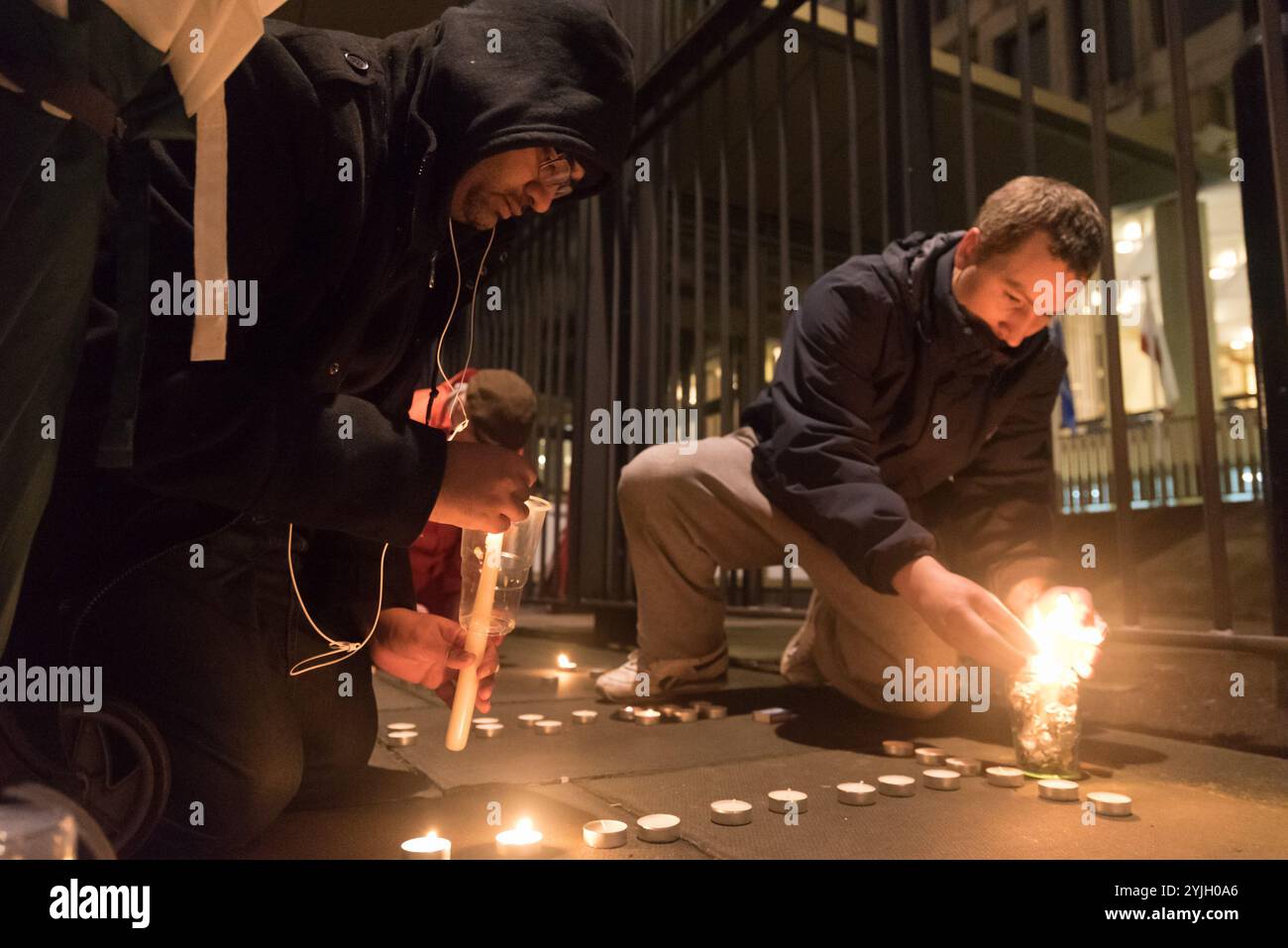 London, UK. 11th January 2018. People light candls for the candlelight ...