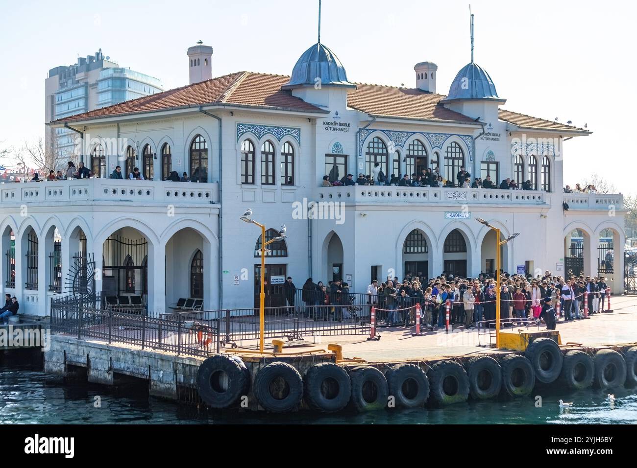 Water Pier and people waiting for ferry at Besektas area of Istanbul ...