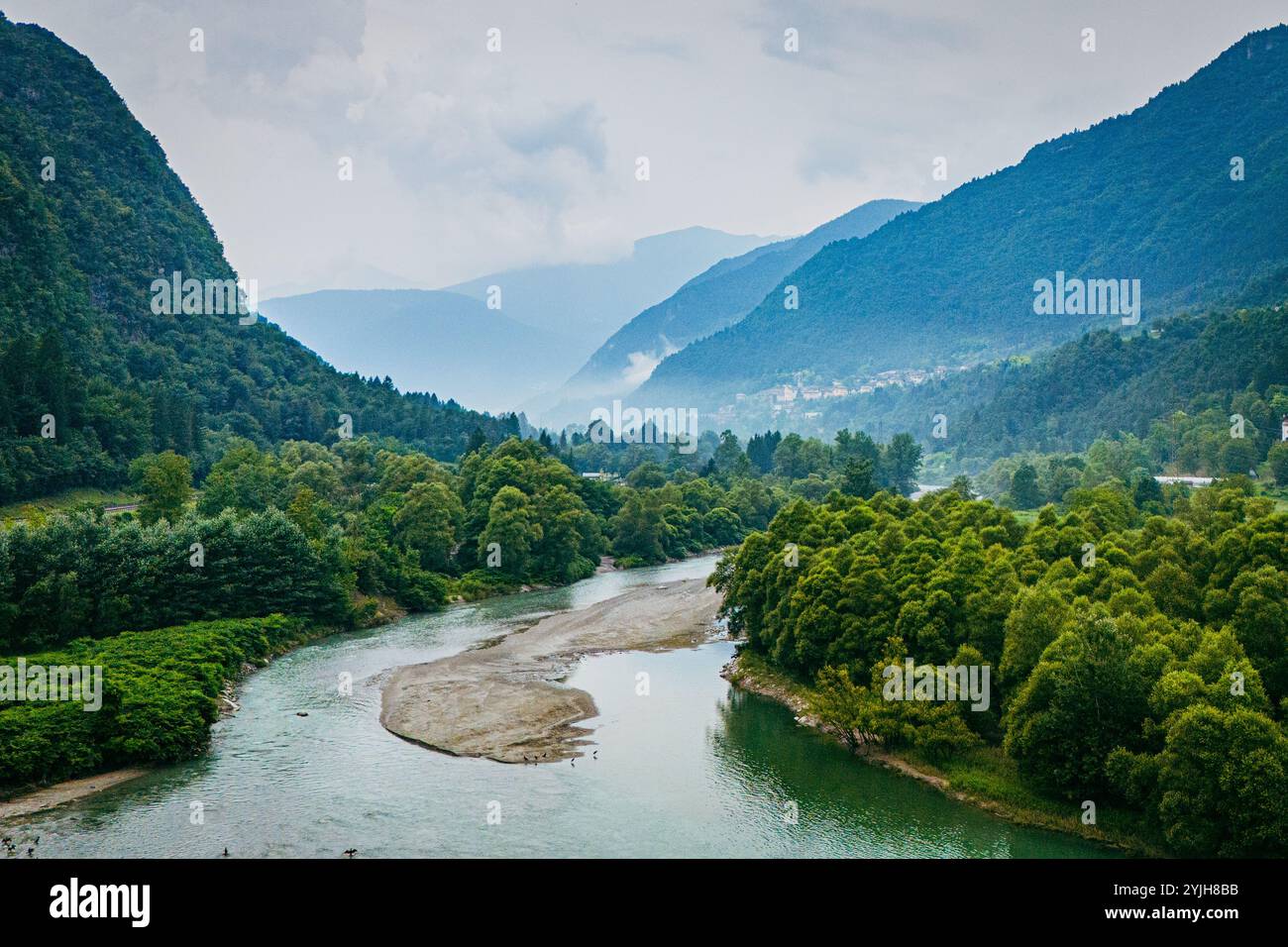 STENICO, ITALY – AUGUST 28, 2024: The serene Lago di Ponte Pià, nestled ...
