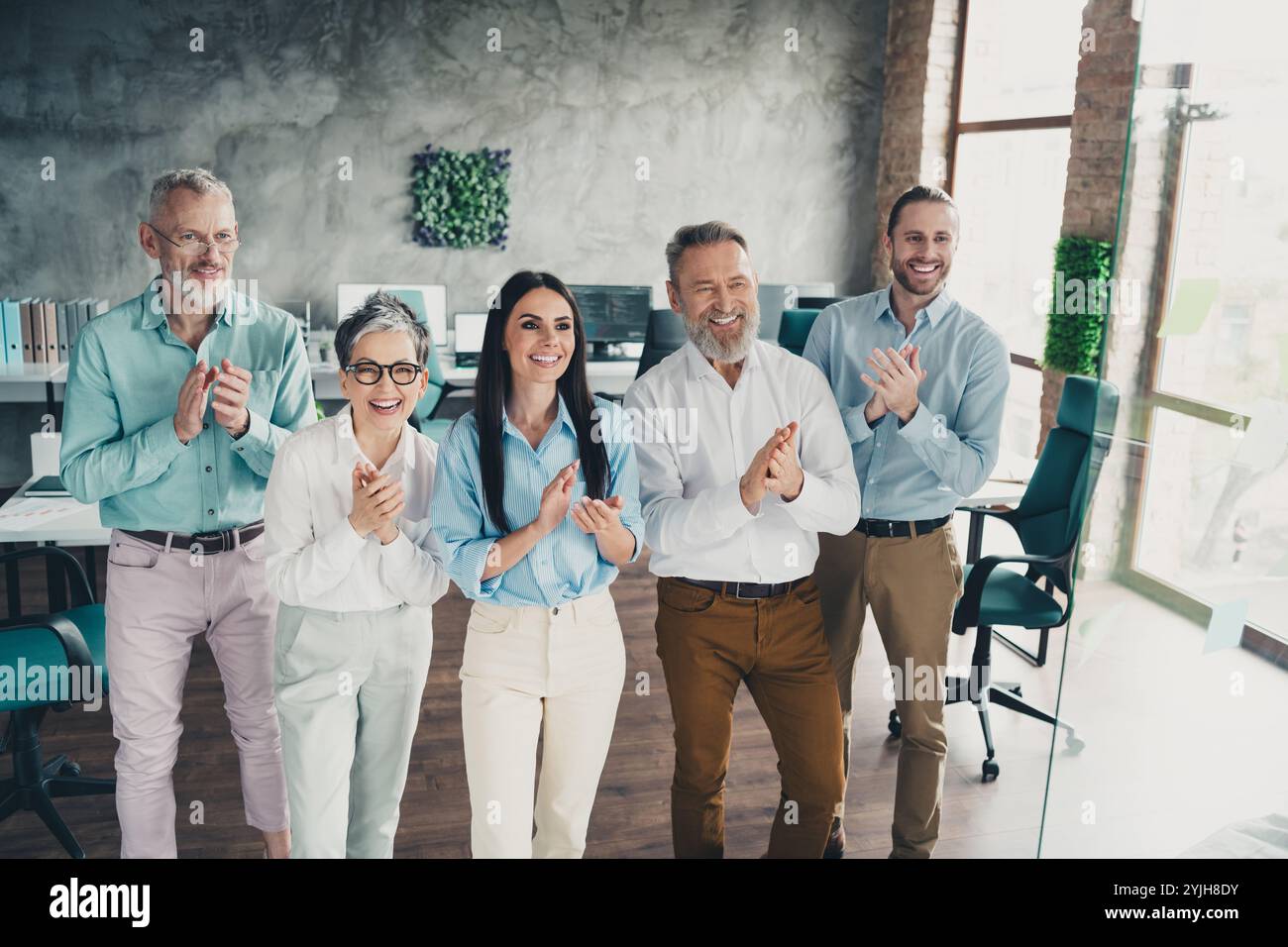 Photo of teamwork startup partners applause clapping hands congratulate ...