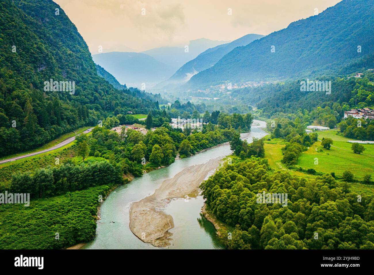 STENICO, ITALY – AUGUST 28, 2024: The serene Lago di Ponte Pià, nestled ...