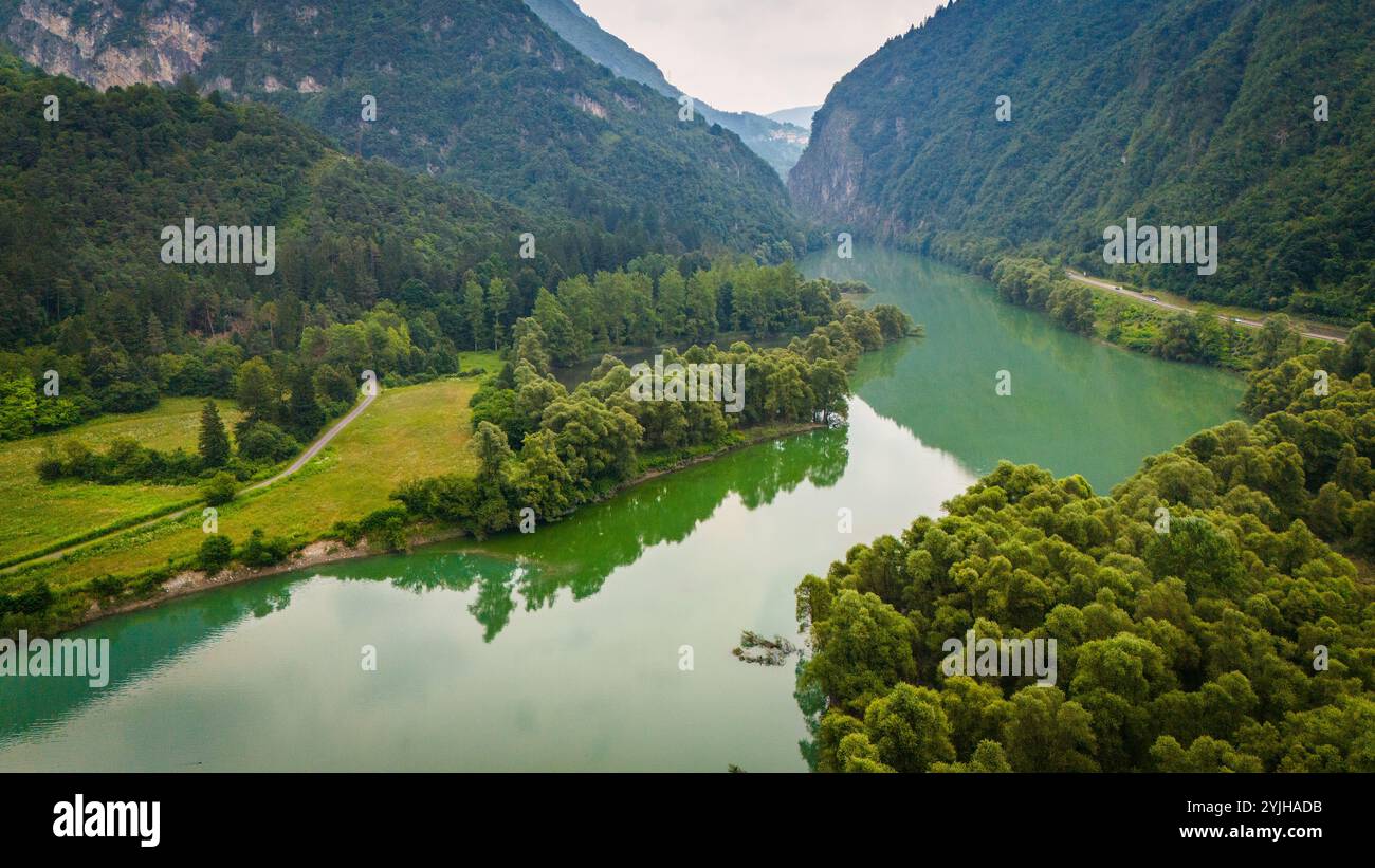 STENICO, ITALY – AUGUST 28, 2024: The serene Lago di Ponte Pià, nestled ...