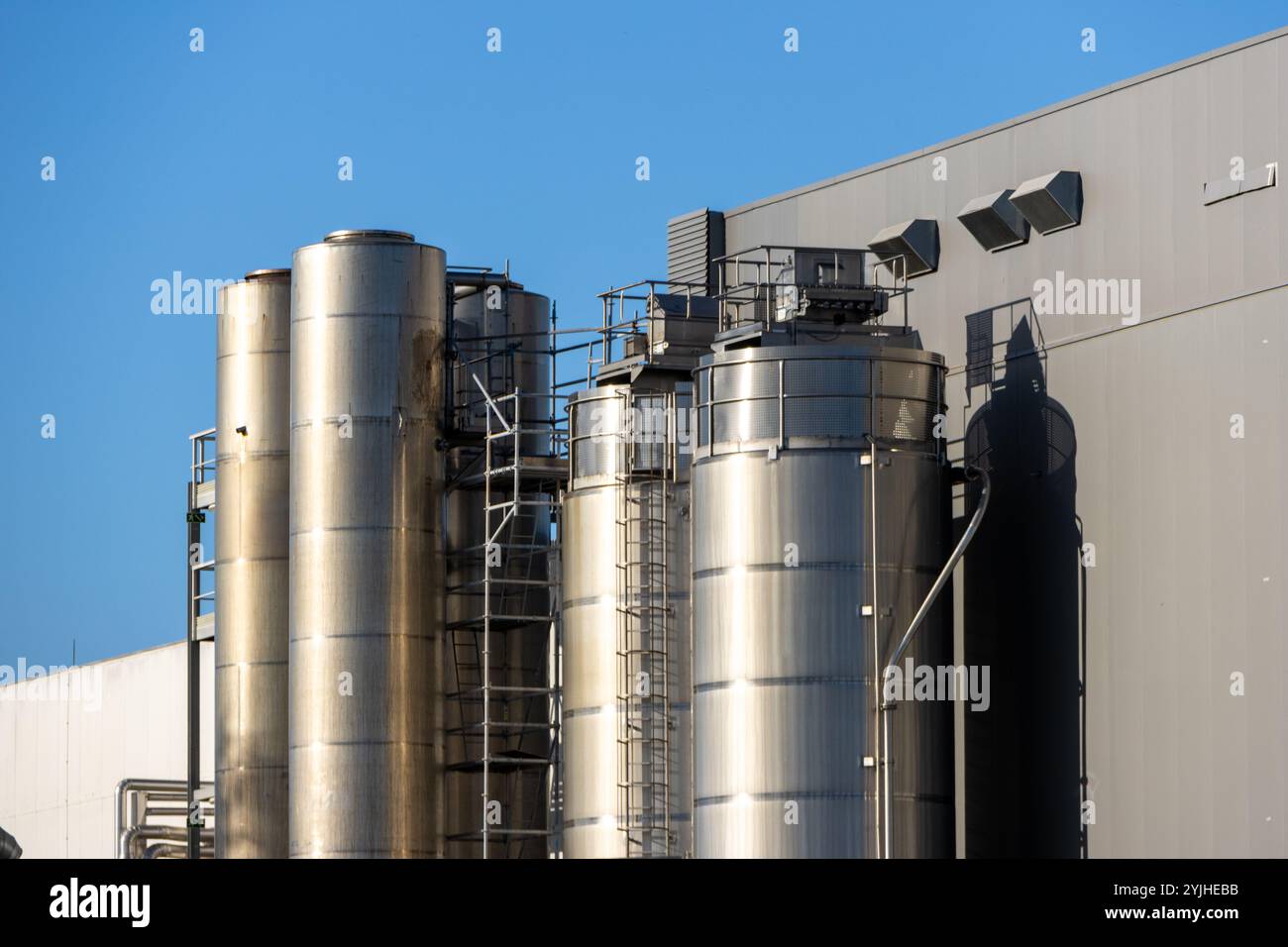 Metal silos storing ingredients at a food processing factory ...
