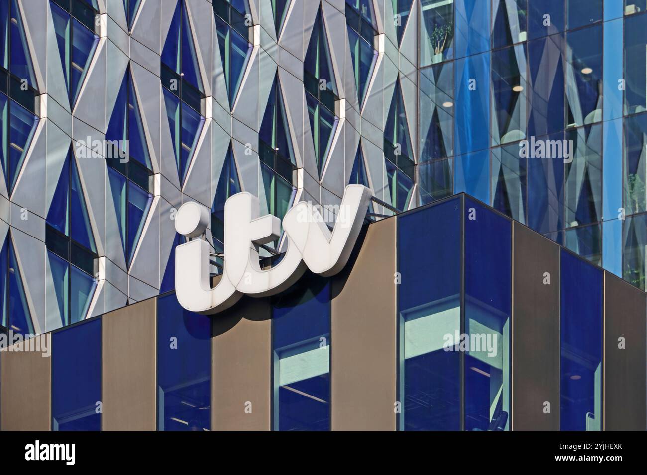 ITV logo mon building, Media City, Salford Quays Stock Photo - Alamy