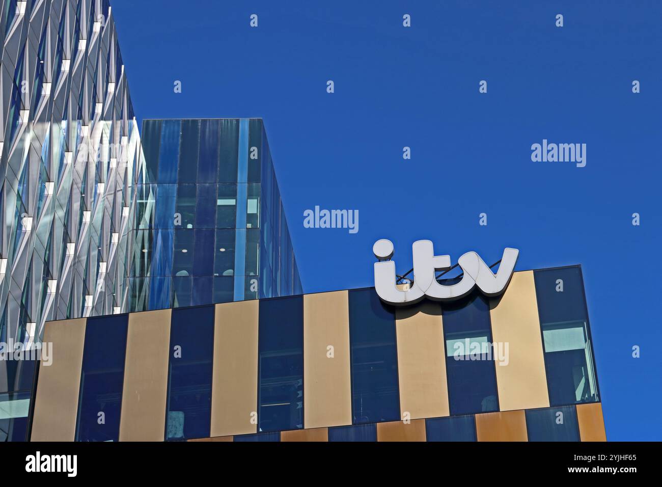 ITV logo on building, Media City, Salford Quays Stock Photo - Alamy