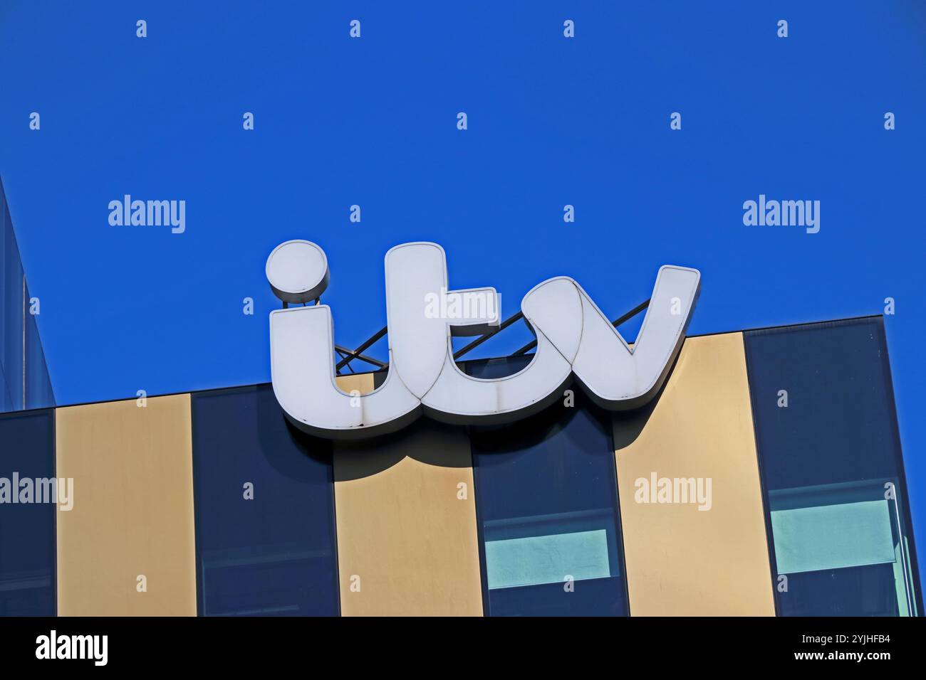 ITV logo on building, Media City, Salford Quays Stock Photo - Alamy