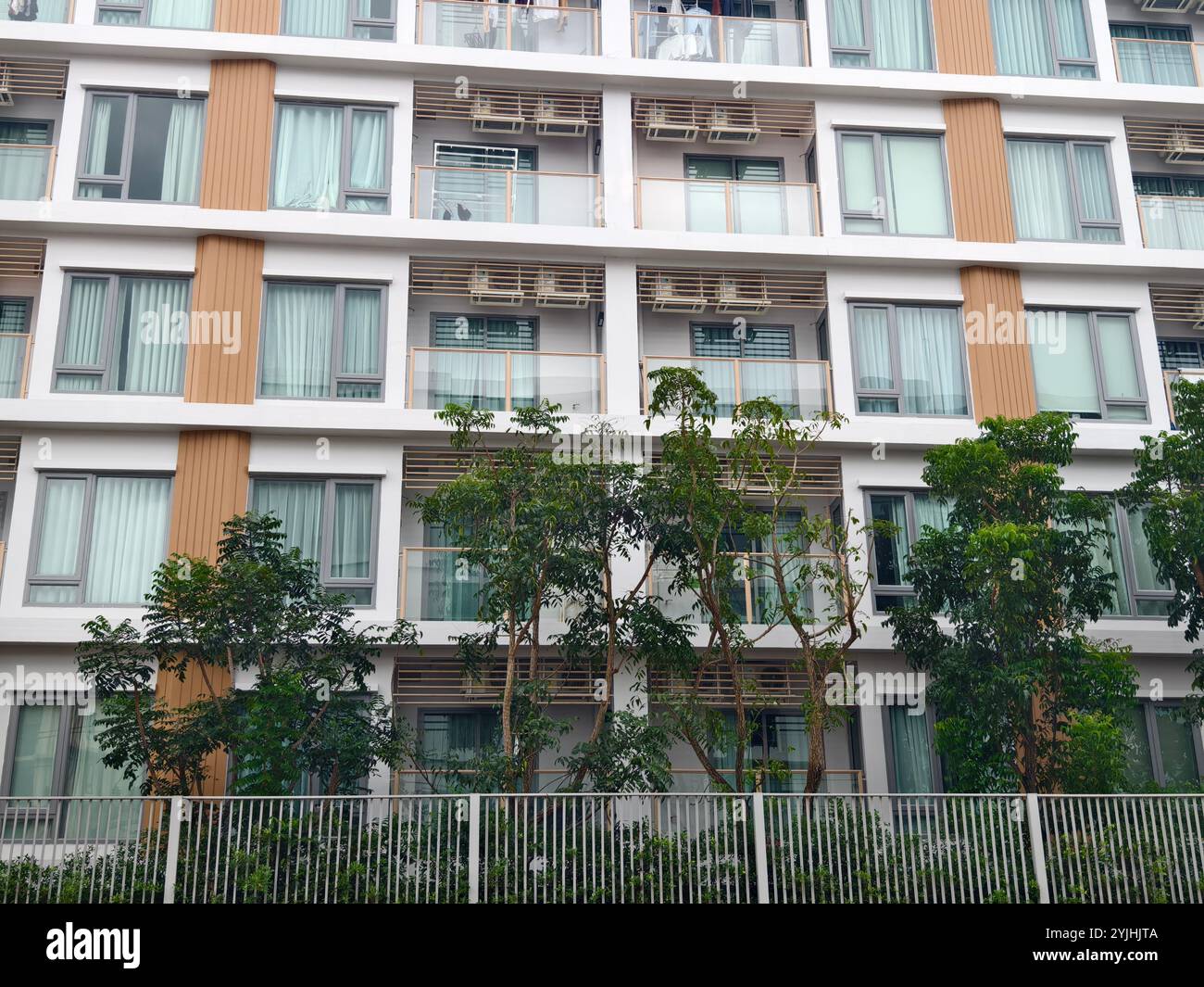 Detailed view of windows, doors and balconies of city buildings in ...